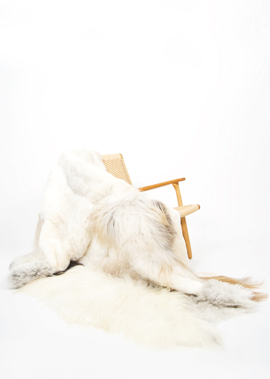 Melange Sheepskin Rugs | Sheepskin Rug Canada | Black Sheep (White Light)